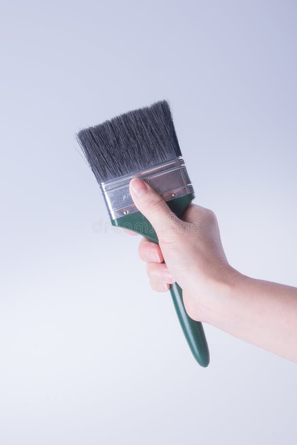 Paint Brush with Hand. Paint Brush with Hand on a Background. Stock ...