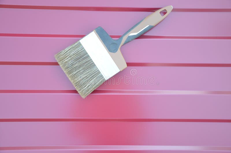 Paint Brush on the Maroon Roof Red Stock Image - Image of metal, bucket ...
