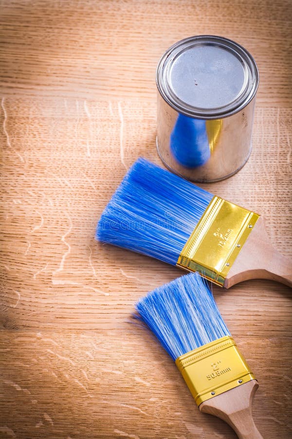 Paint Brushes and Can on Wooden Board Stock Photo - Image of ...