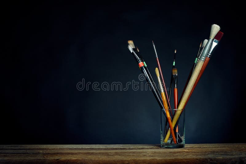 Paint brushes in a glass stock image. Image of bunch - 85195371