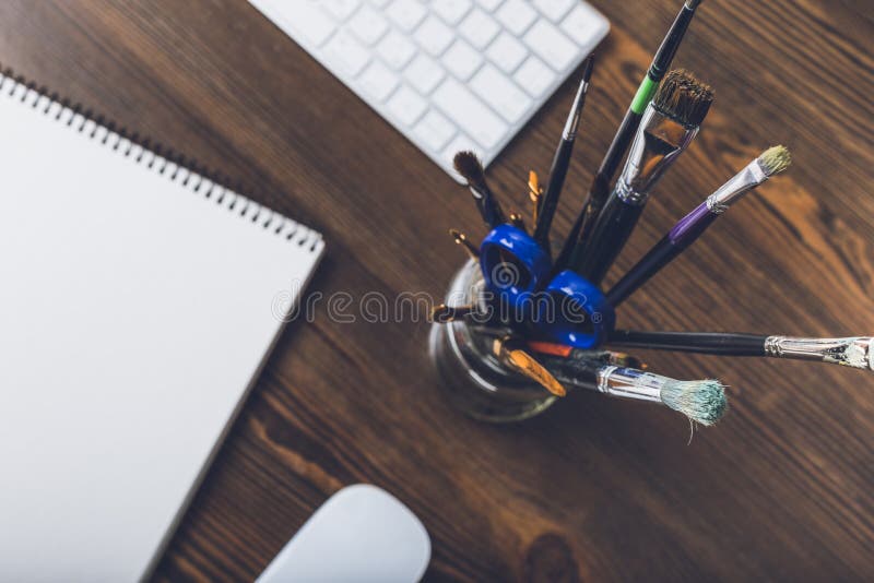 Paint Brushes with Office Supplies, Drawing Album, Computer Mouse and ...