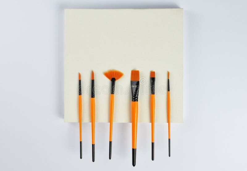 Paint Brushes on Canvas Frame Stock Photo - Image of work, brushes ...