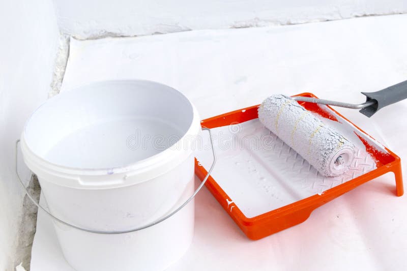 Paint Can, Roller and Paint Tray for Painting Wall on the Floor Stock ...