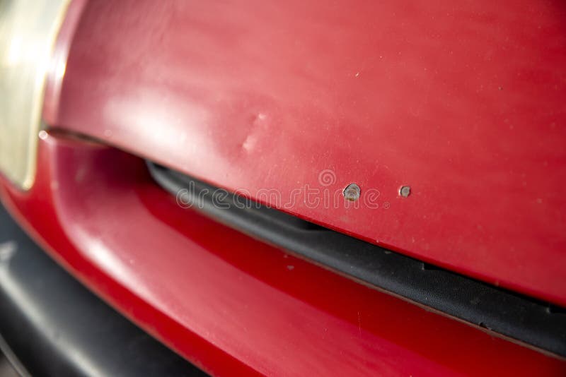 Paint Damage on the Hood of a Red Car, Corrosion and Rust Stock Photo ...