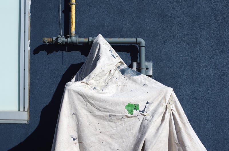 Paint Drop Cloth and Blue Wall Stock Image - Image of backgrounds ...