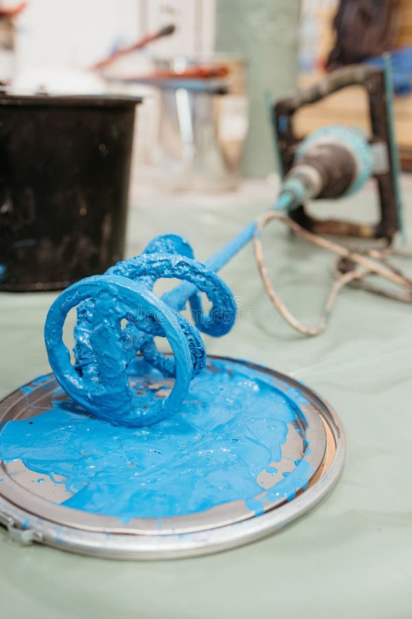 Paint Mixer with Blue Paint in a Creative Setting. Stock Photo - Image ...
