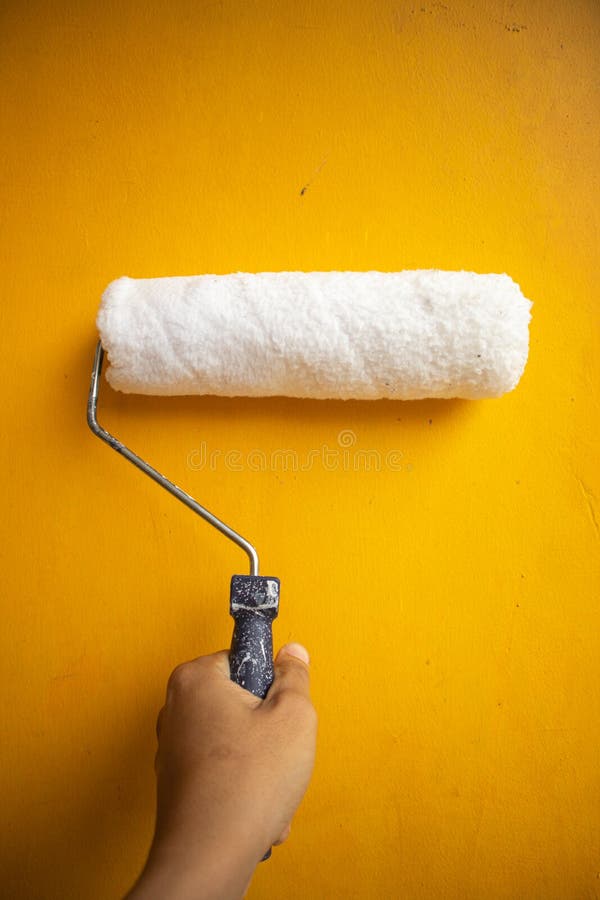 A Paint Roll Brush with a Blue Plastic Handle Stock Image - Image of ...