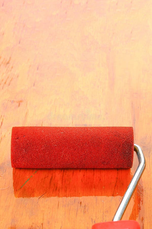 Paint Roll Brush in Paint on Plywood Surface Stock Image - Image of ...