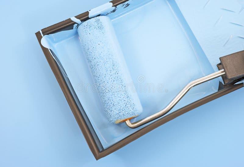 Paint Roller with Blue Paint in Tray Stock Photo - Image of liquid ...