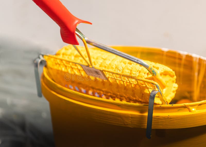 Paint Roller on a Bucket with Paint Stock Photo - Image of color ...