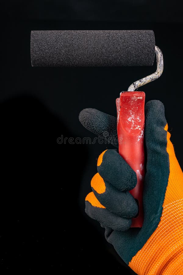 Paint Roller in Hand. Painting Oil Paint on Flat Surfaces Stock Image ...