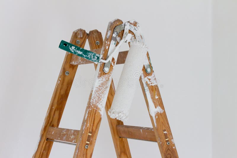 Paint Roller on a ladder stock image. Image of construction - 37789019
