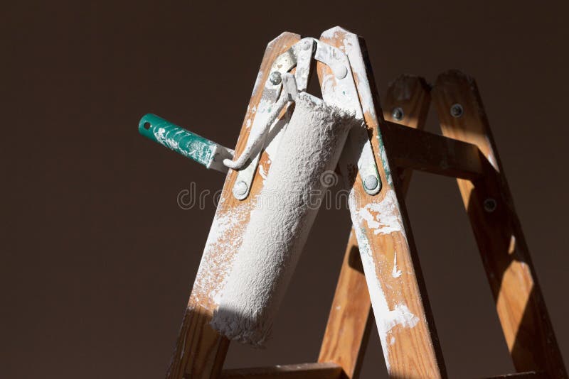 Paint Roller on a ladder stock image. Image of indoors - 37789149