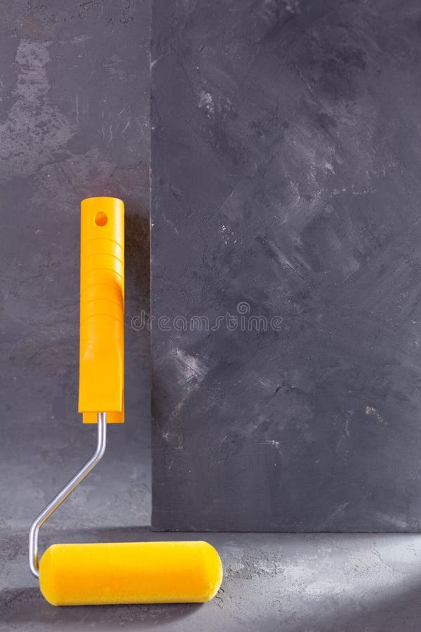 Paint Roller Tool on Cement Background. Construction Tools on Concrete ...