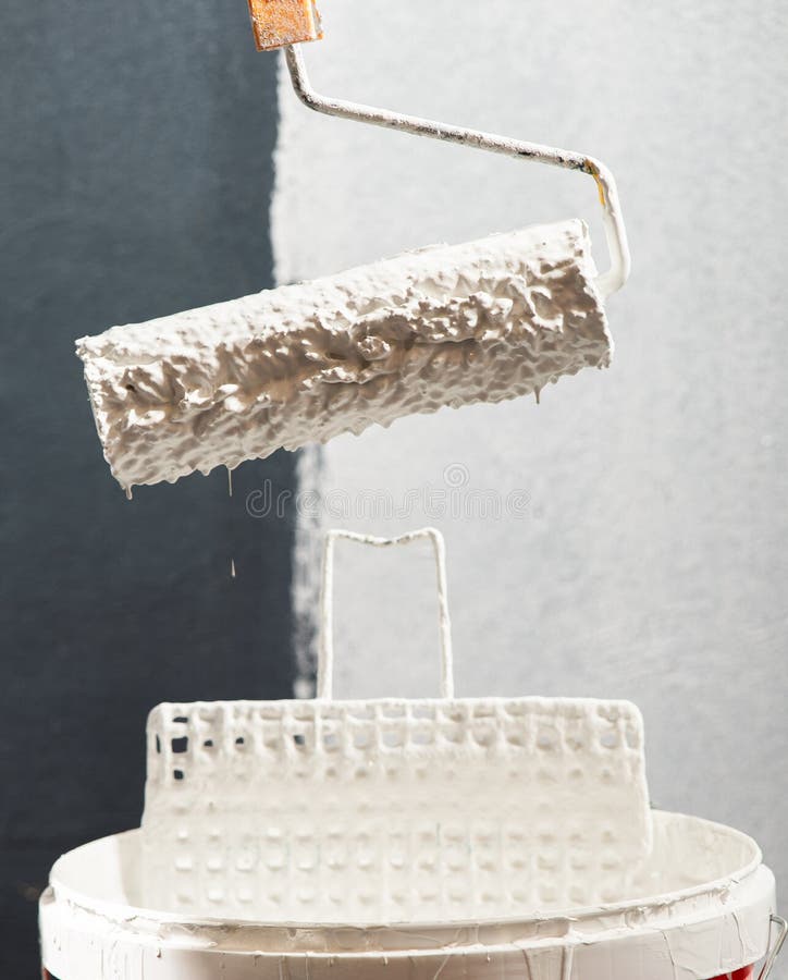 Paint Roller on the White Color Bucket Stock Image - Image of wall ...