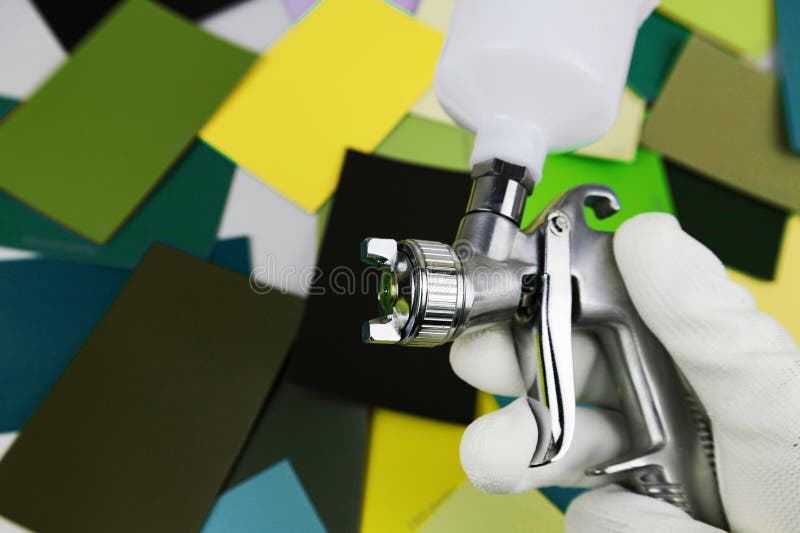 Paint Spray Gun at Work at the Workplace in the Workshop, Selection of ...