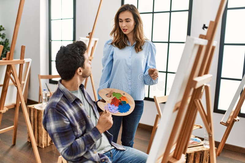 Paint Teacher Teaching To Student at Art School Stock Photo - Image of ...