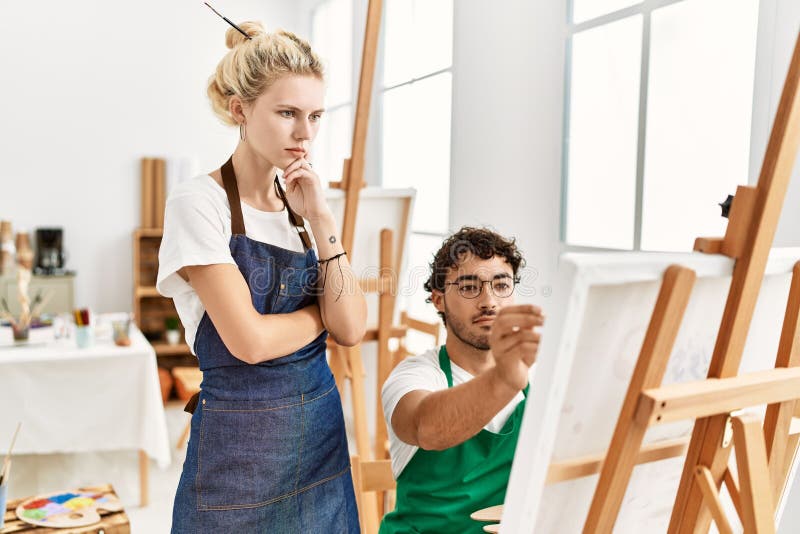 Paint Teacher Woman Teaching To Student Man at Art Studio Stock Photo ...