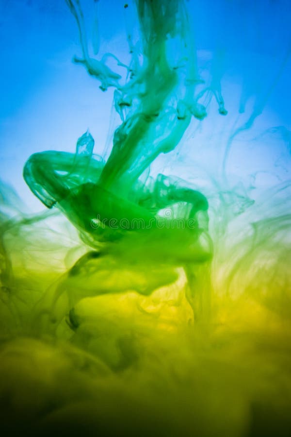 Paint in Water, Green, Yellow Ink, Red, Blue Stock Image - Image of ...