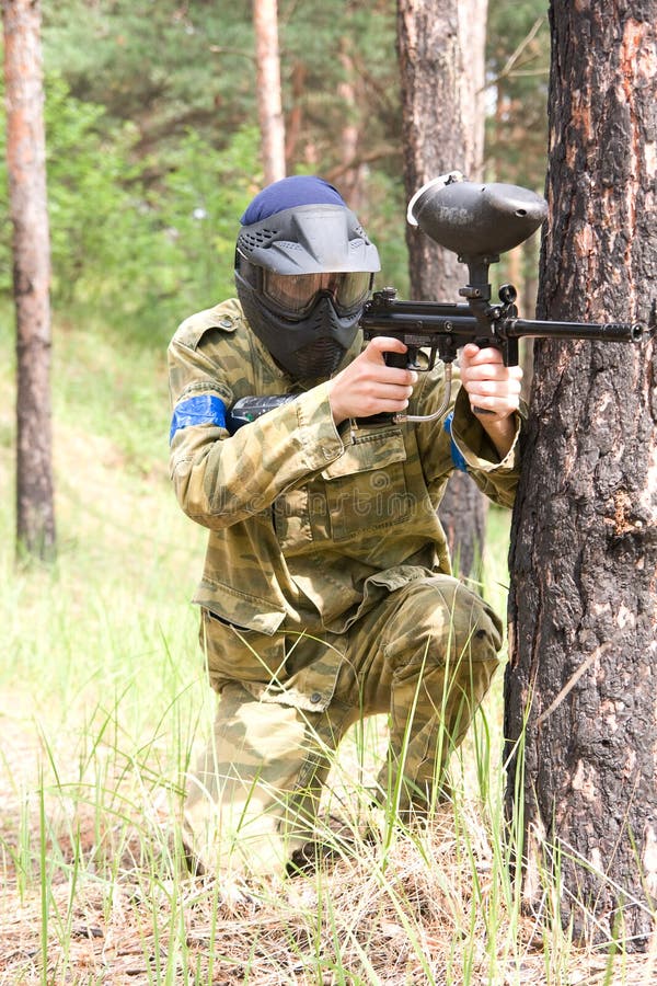 Paintball Player in the Forest Stock Photo - Image of targeting ...