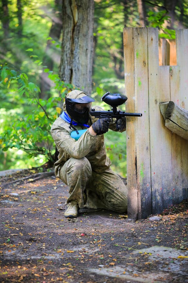 Paintball Player in Full Gear at the Shooting Range Stock Photo - Image ...