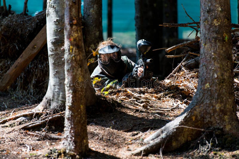 Paintball Player Hide Behind Tree Stock Image - Image of excitement ...