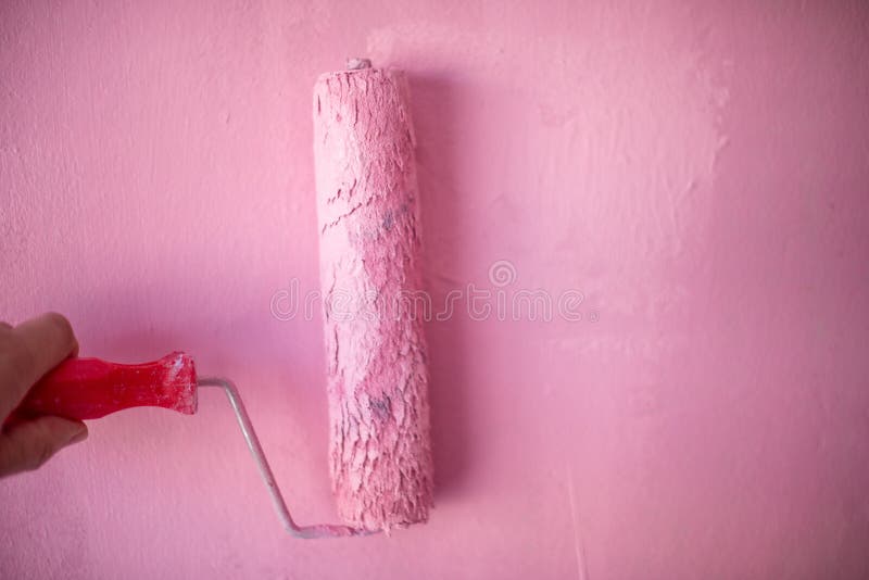 Paintbrush Applying Pastel Colored Paint To Wall Stock Photo - Image of ...