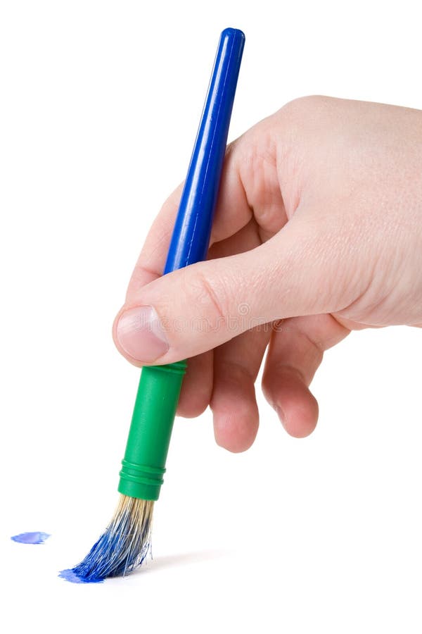 Paintbrush in hand stock photo. Image of painter, color - 22946074