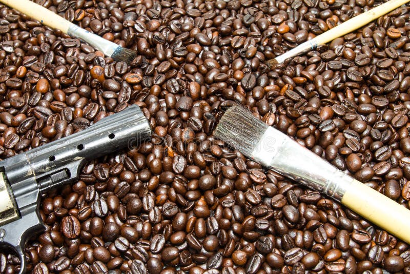 Paintbrush toy gun coffee stock image. Image of close - 45381397