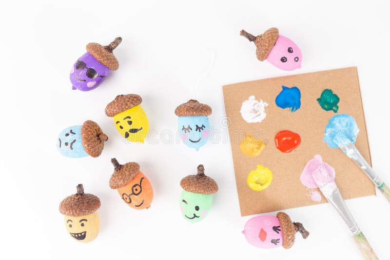 Painted Acorns Have a Variety of Expressions, Including Happy, Sad, and ...