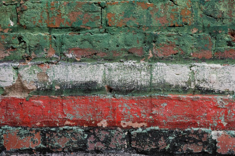 Painted Brick Wall with Red, Green and Black Stripes Stock Image ...
