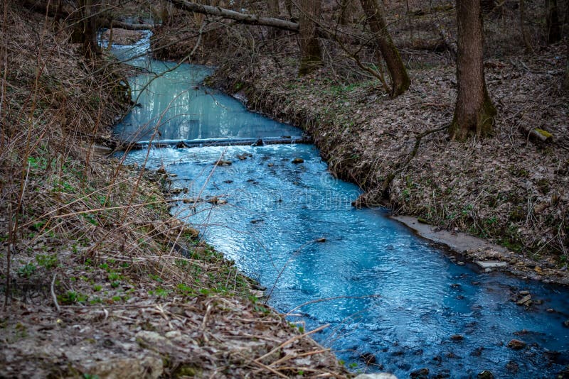Painted in a Bright Blue River Stock Photo - Image of outdoor, vitriol ...