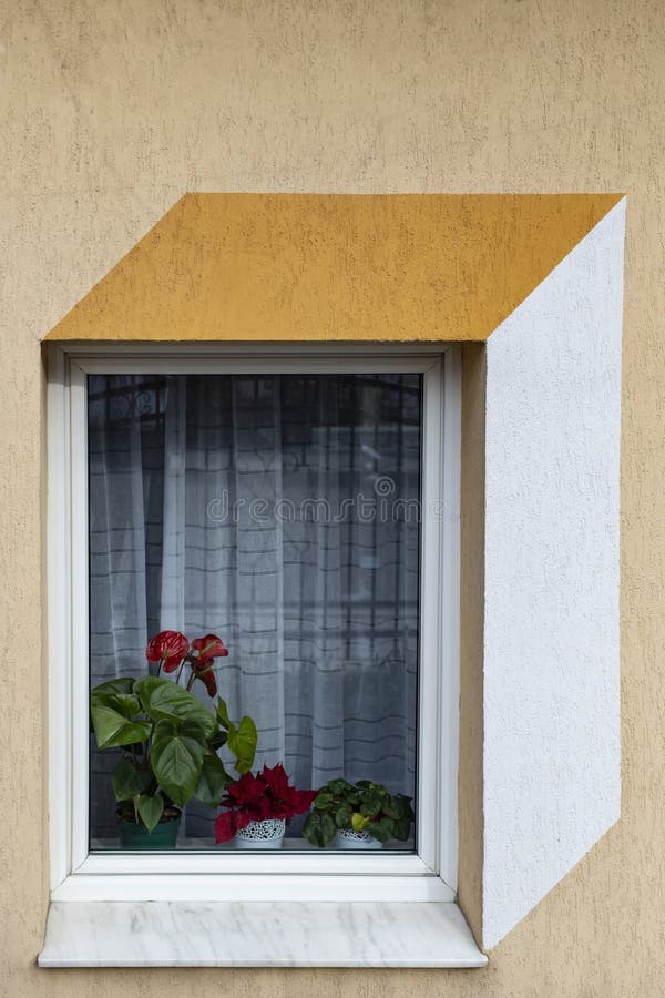 Painted Decorative Perspective Geometric Design on a Window on a Beige ...