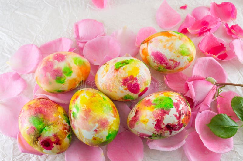 Painted Easter Egg on Pink Rose Petals Stock Image - Image of gift ...