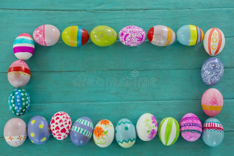 Painted Easter Eggs Arranged in Rectangle Shape on Wooden Plank Stock ...