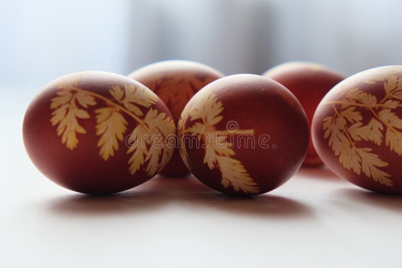 Painted Easter Eggs on a White Background. Floral Pattern on a Red ...