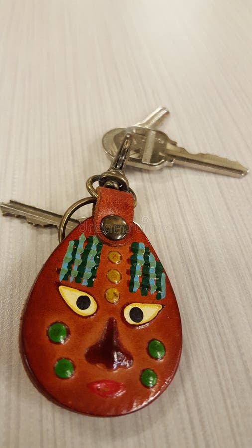 Painted Face Key Ring on Grey Table Stock Photo - Image of jewellery ...