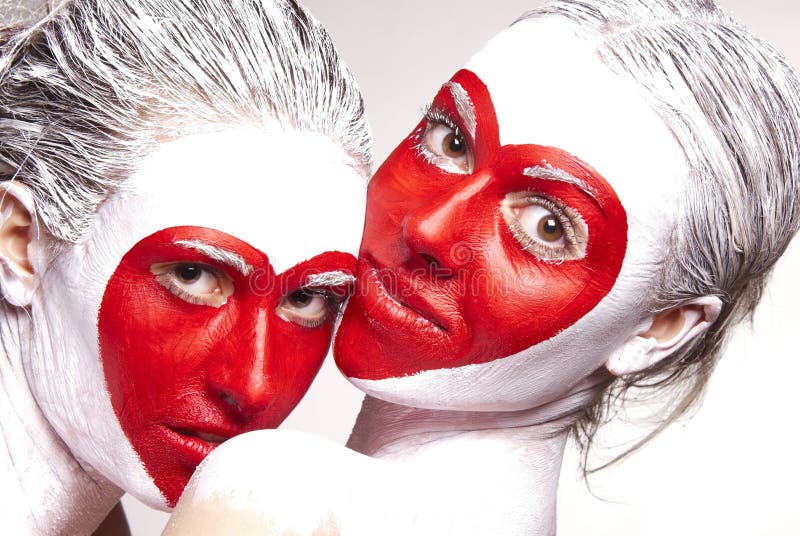 Pretty Girls with Faces Painted Red Heart Shapes Stock Image - Image of ...