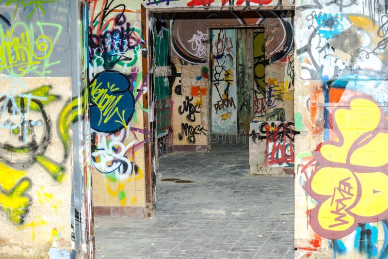 Painted Graffiti in an Abandoned Factory Building. Editorial Stock ...