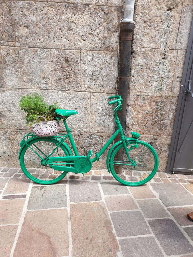 Green Cycle Parking Sign on a Wall at Shopping Centre Stock Photo ...