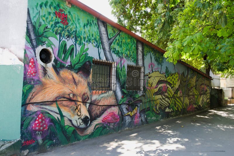 Painted mural on the wall editorial stock image. Image of street ...