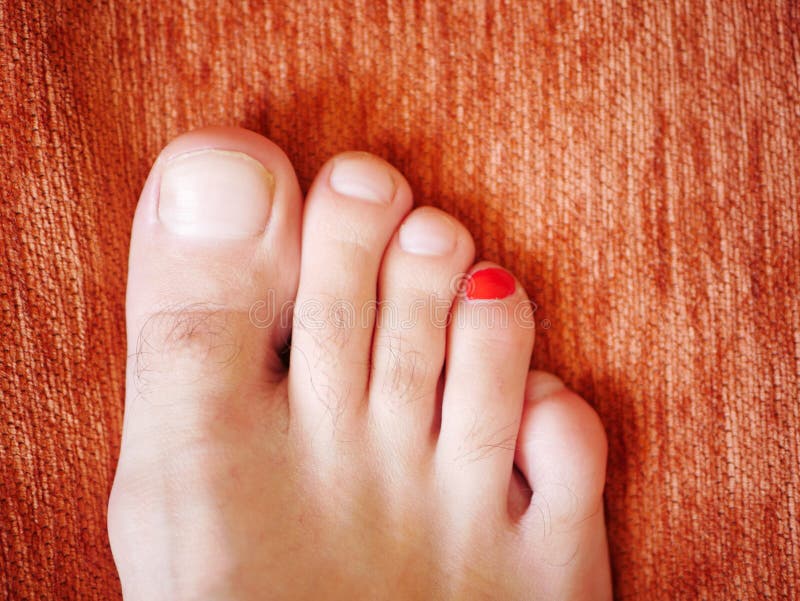 Painted Nail on the Male Foot. in Red Stock Image - Image of color ...