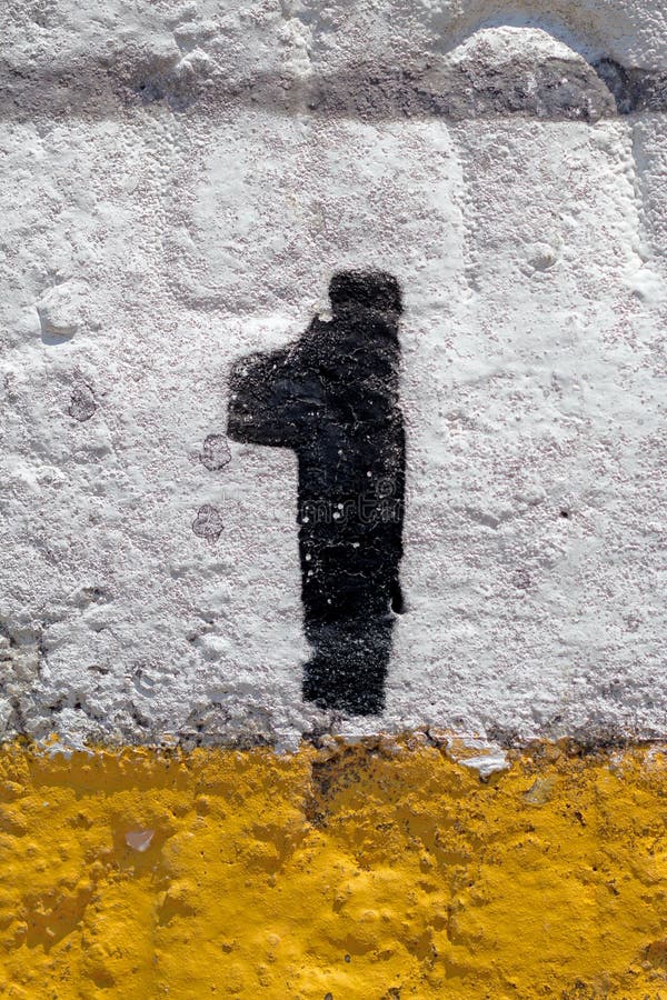 Painted Number One (1) on a White Concrete Wall Stock Image - Image of ...