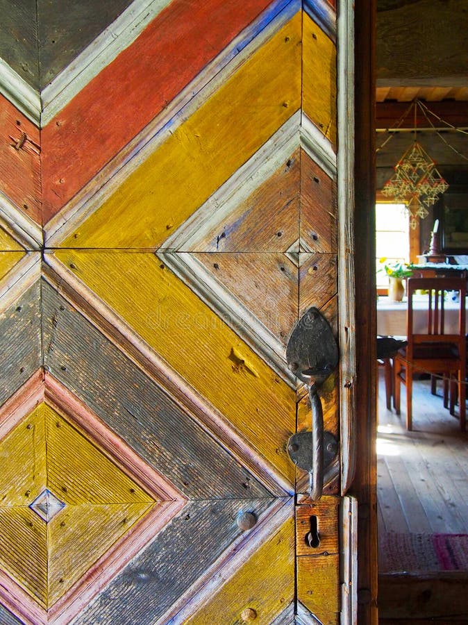 Painted Pattern on Rustic Wooden Door Stock Photo - Image of exterior ...