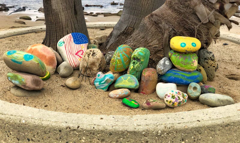 Painted rocks beach decor stock image. Image of beach - 168173489