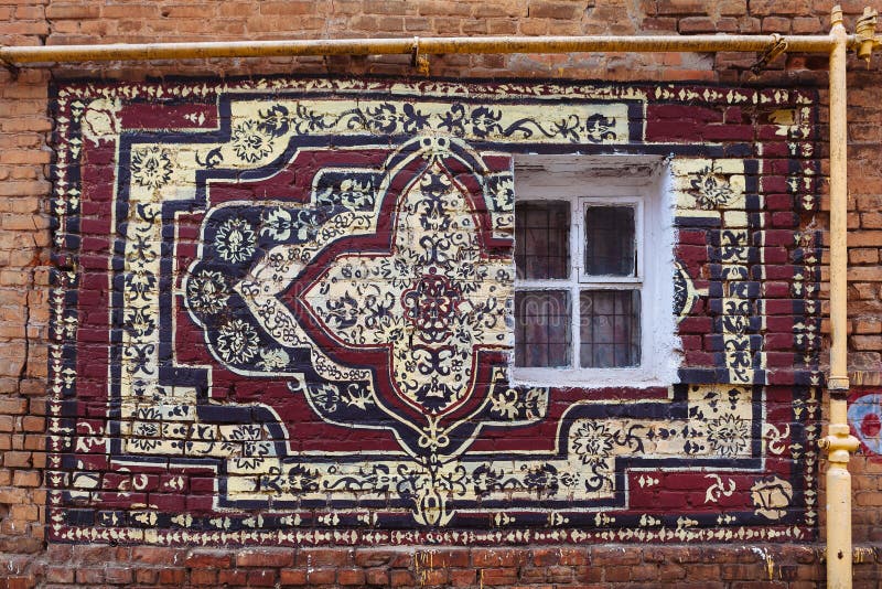 Painted Rug on a Brick Wall Stock Photo - Image of estate, beautiful ...