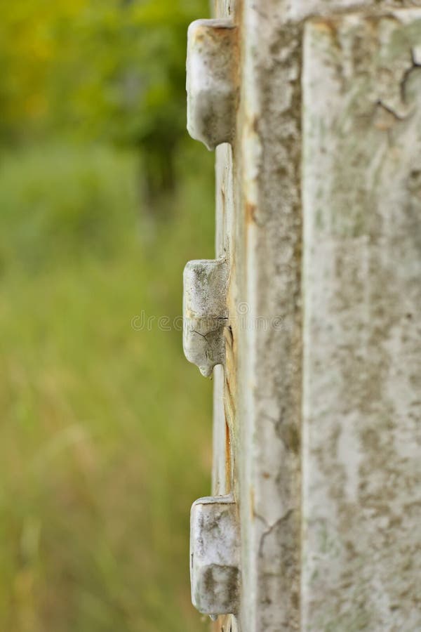 A Pole on the Side of a Building Has a Sign Stock Image - Image of ...