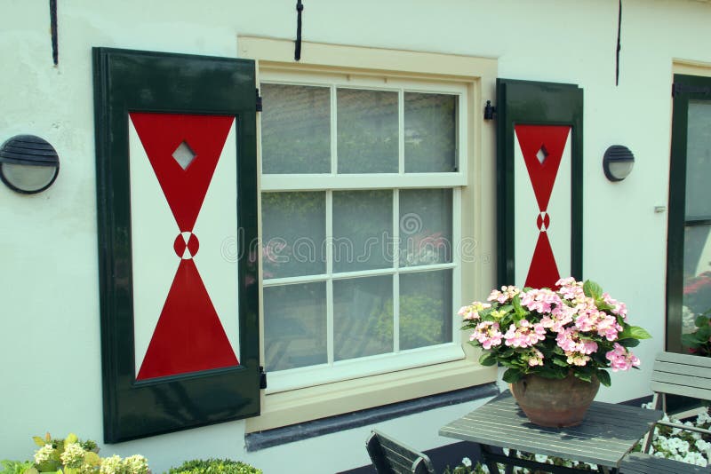 Painted Shutters with Triangle Design on Dutch Window in Wassenaar ...