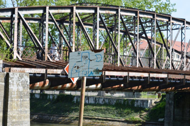 Painted Sign Next To the Bridge Stock Image - Image of vehicle, park ...