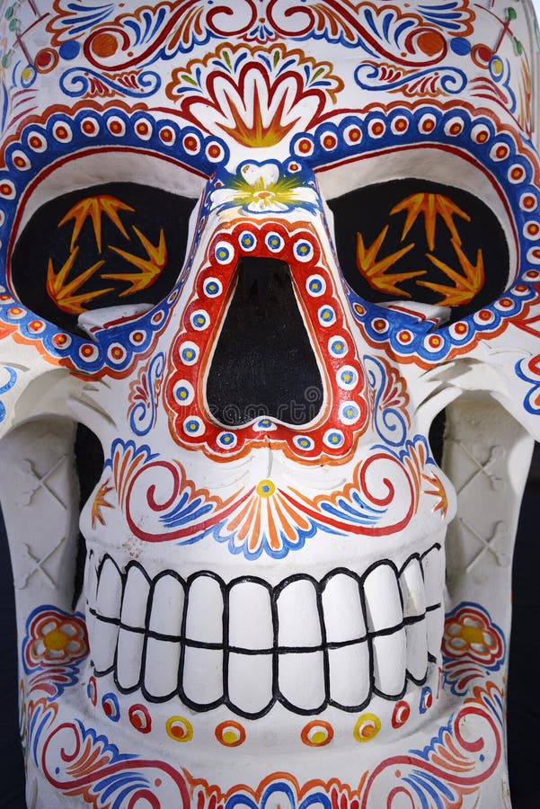 Painted skull on display stock photo. Image of flowers - 164062708